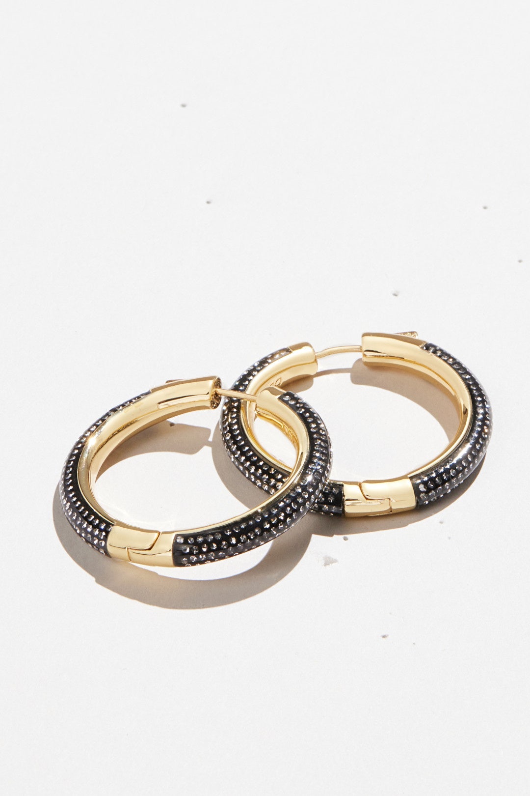 Noir Hoop Earrings by DEMARSON | Rent the Runway